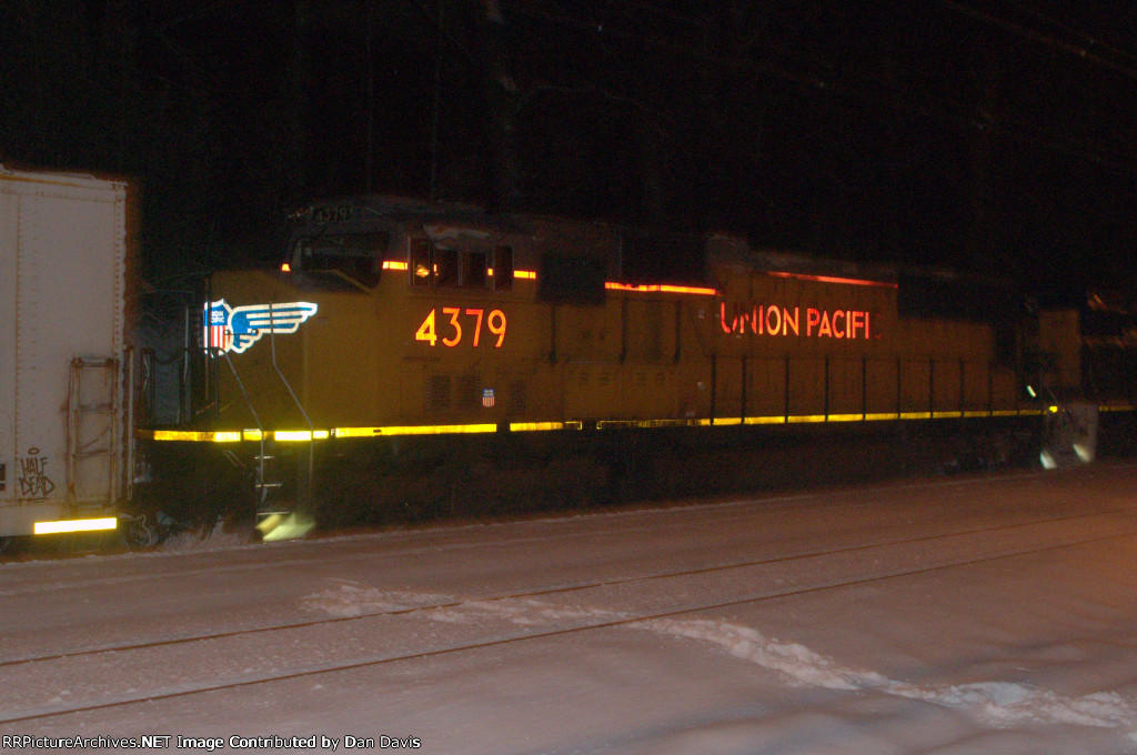 UP SD70M 4379 trails on Q301-15